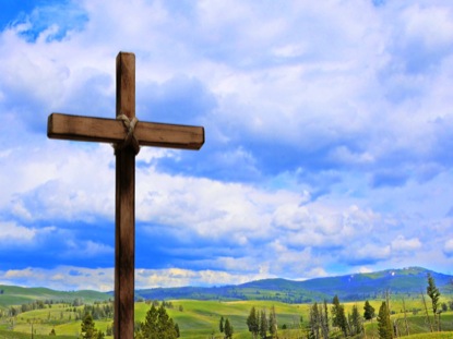 cross in clouds background